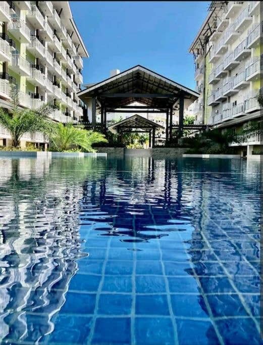 212B Amani Grand Resort Residences near Mactan Airport with pool, gym ...